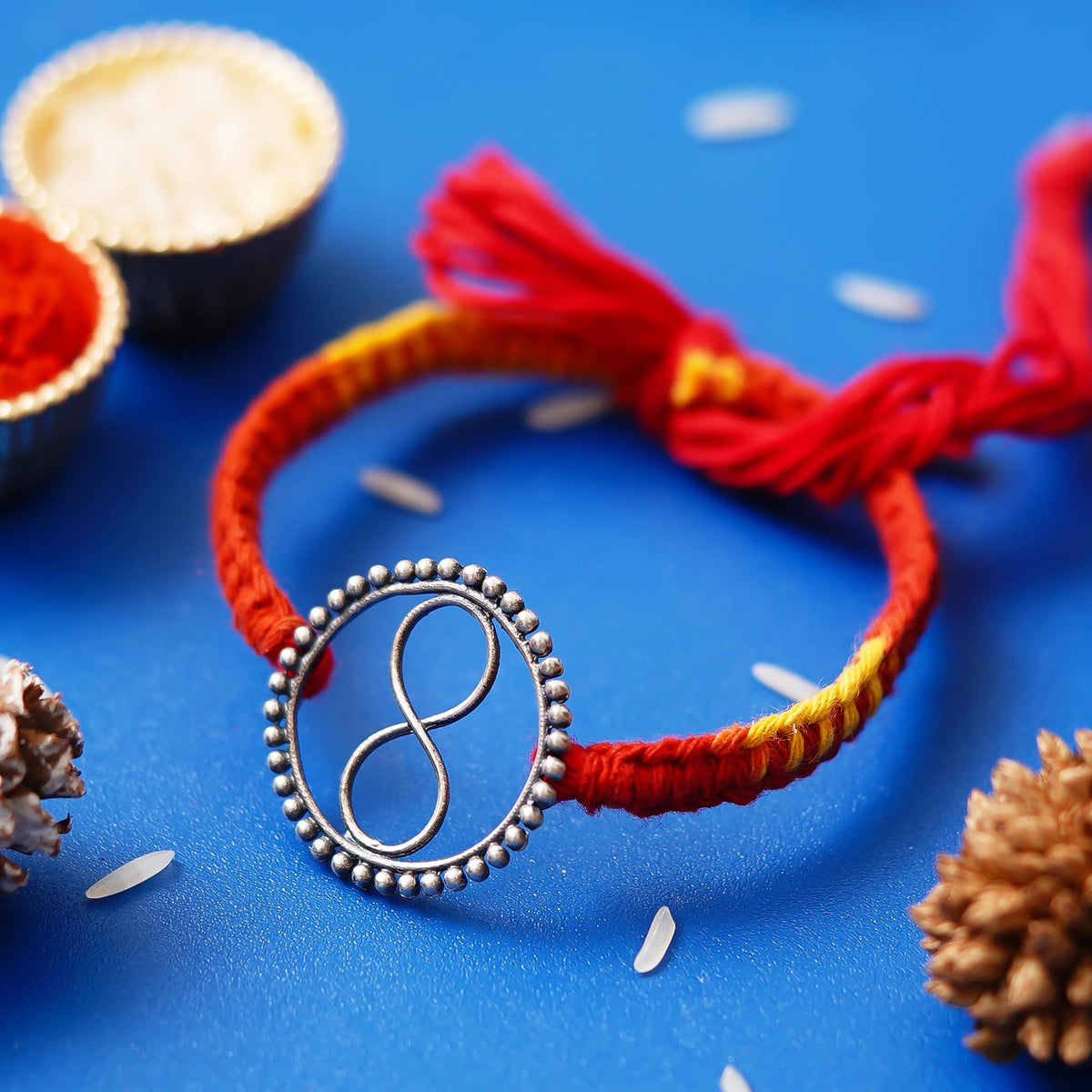 Round Shaped Infinity 925 Sterling Silver Rakhi for Brother with Roli ...