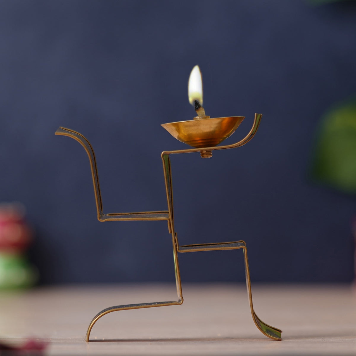 eCraftIndia Golden Metal Swastik Symbol Shape Designer Diya