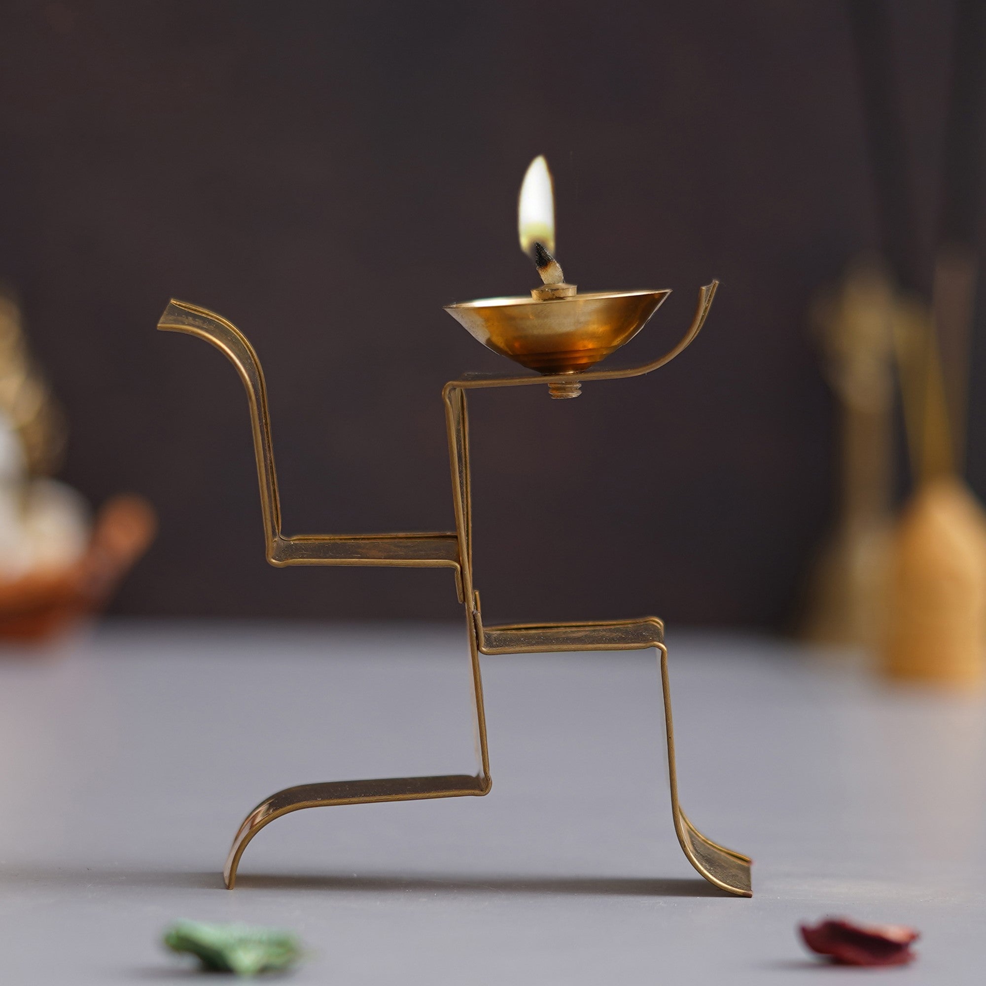 eCraftIndia Golden Metal Swastik Symbol Shape Designer Diya