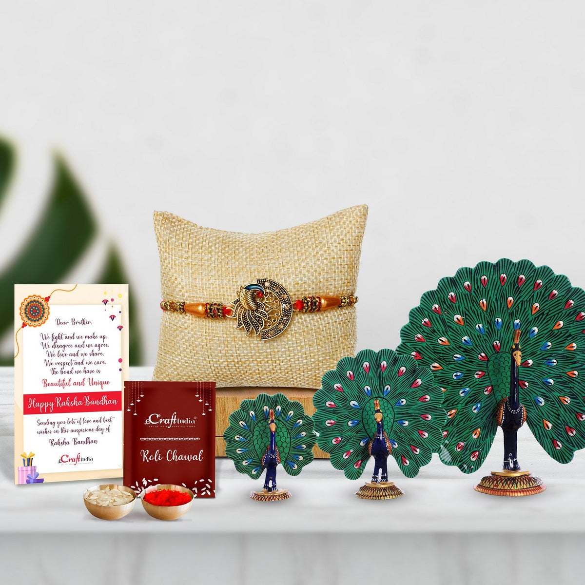 Designer Peacock Rakhi with Set of 3 Coloful Meenakari Dancing Peacocks ...