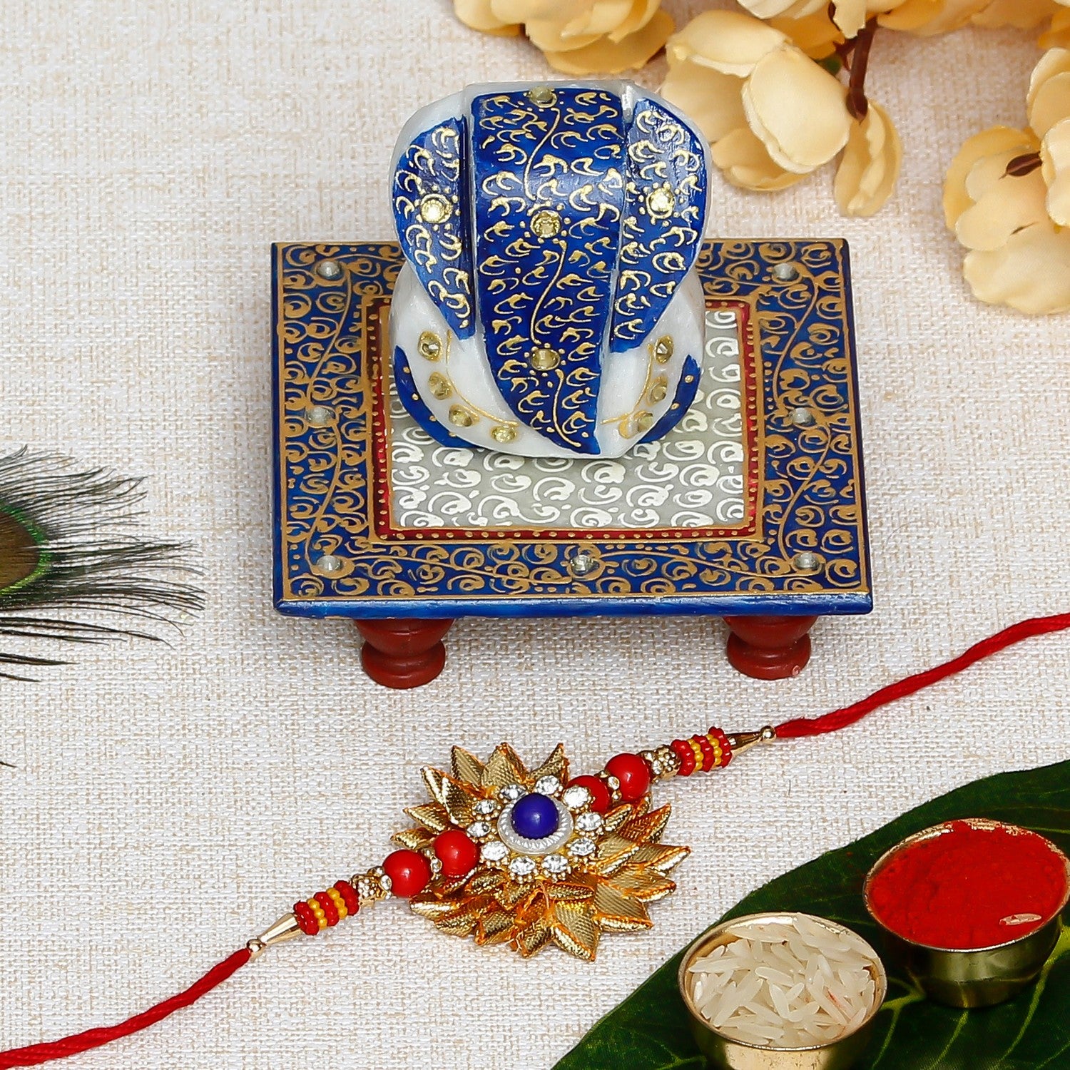 Designer Gota Patti Rakhi with Lord Ganesha Marble Chowki and Roli ...